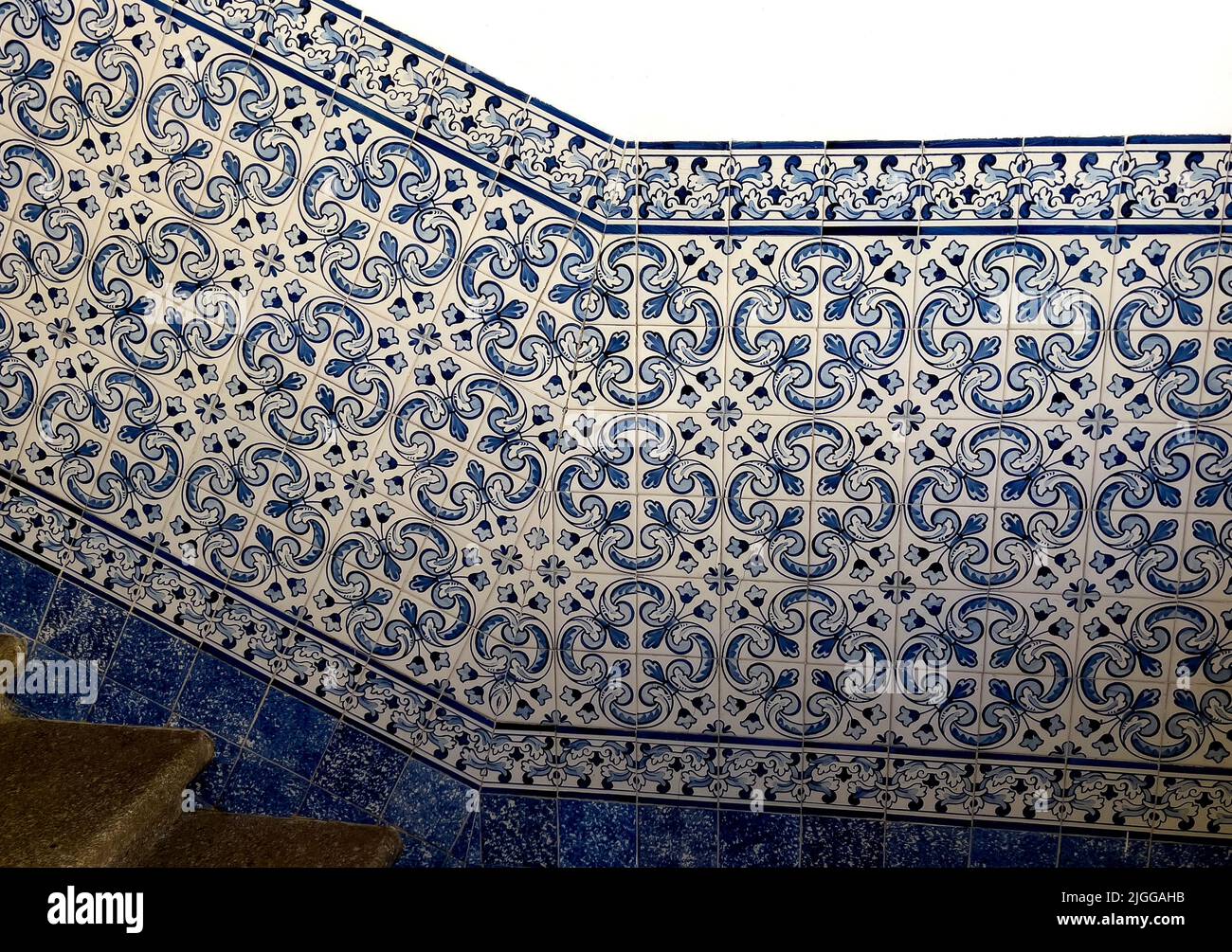 Traditional Portuguese blue tiles decorating the main staircase at the ...