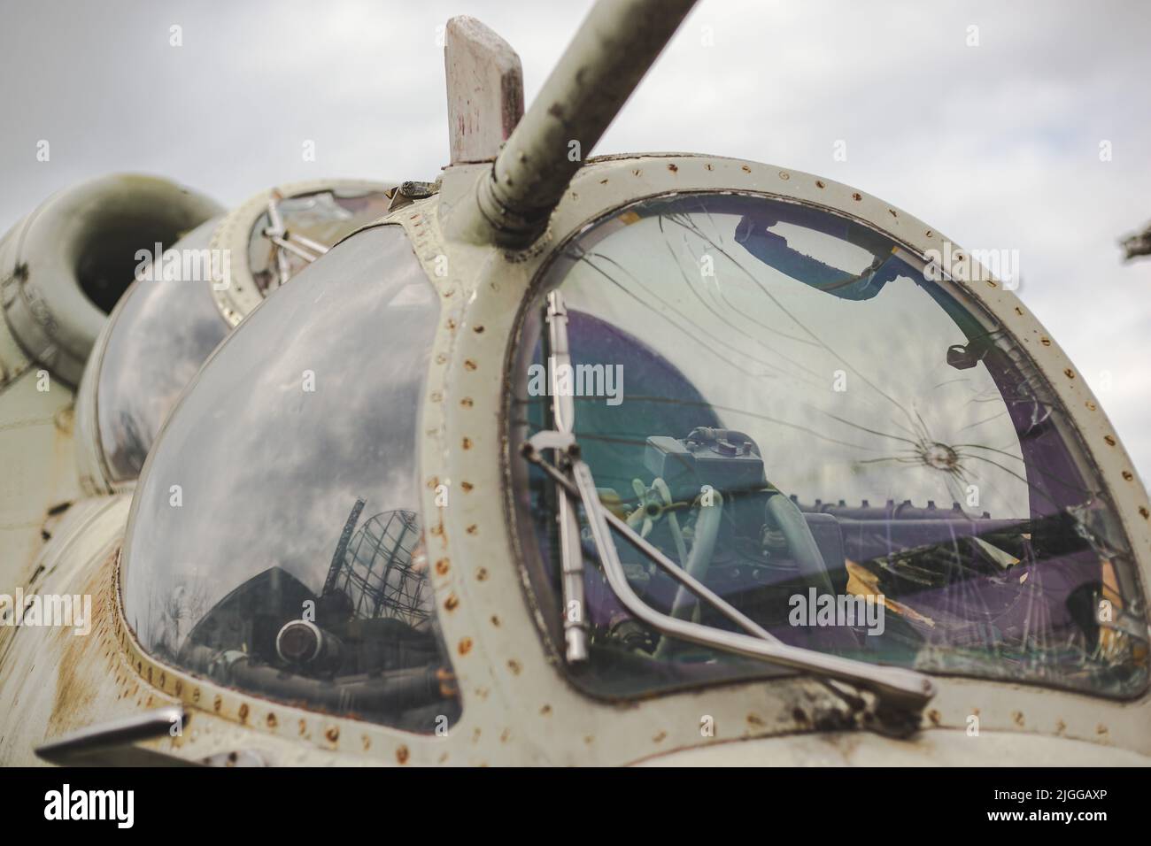 The broken bullet holes on the glass of a MI24 helicopter Stock Photo ...
