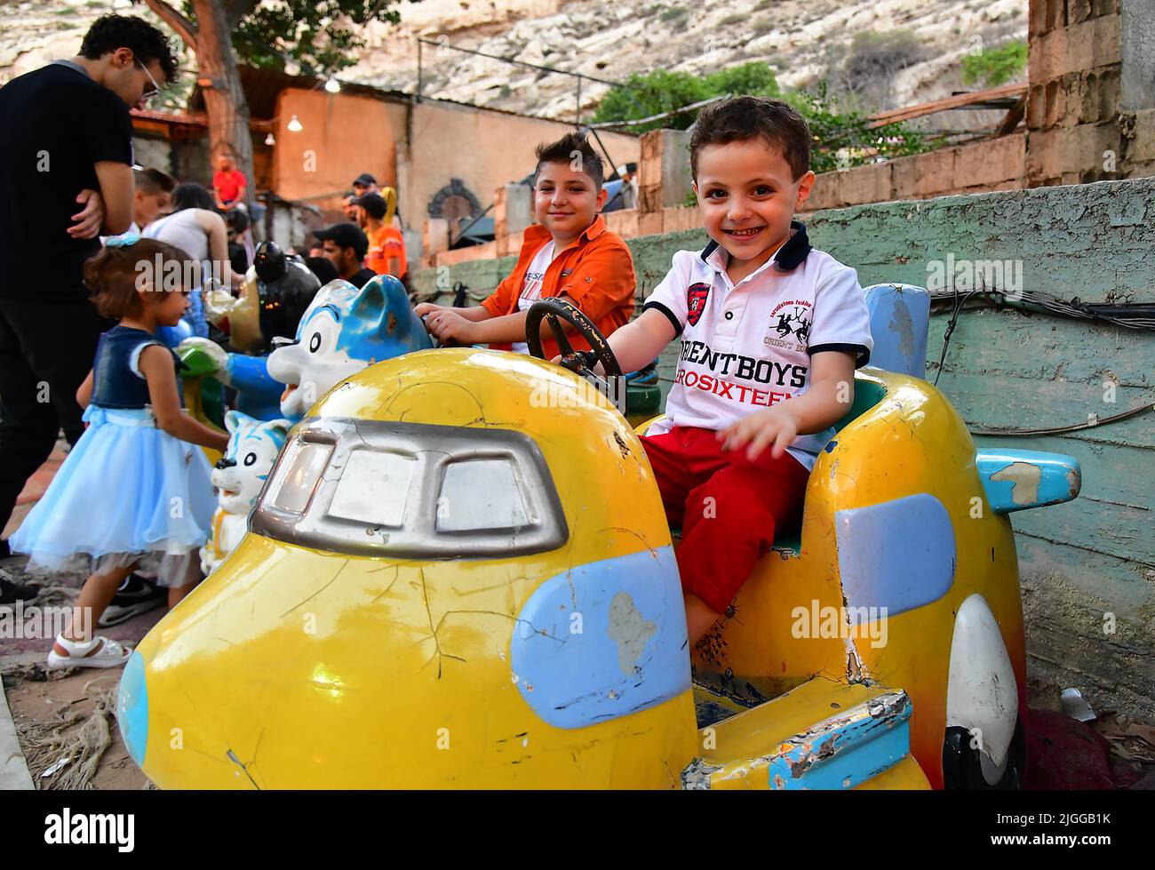 Damascus, Syria. 10th July, 2022. Children spend time at a theme park ...