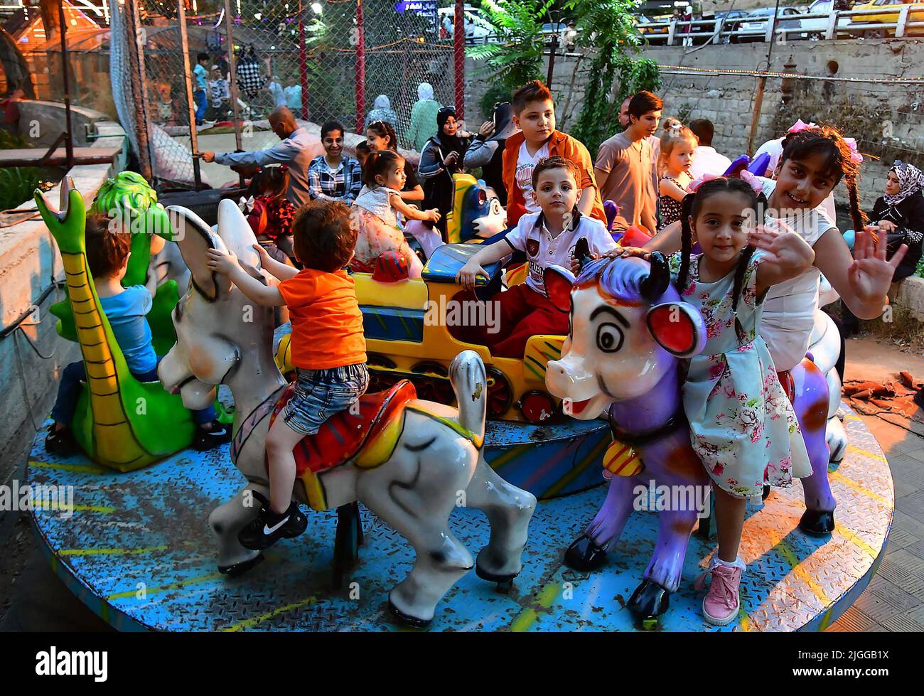 Damascus, Syria. 10th July, 2022. Children spend time at a theme park ...