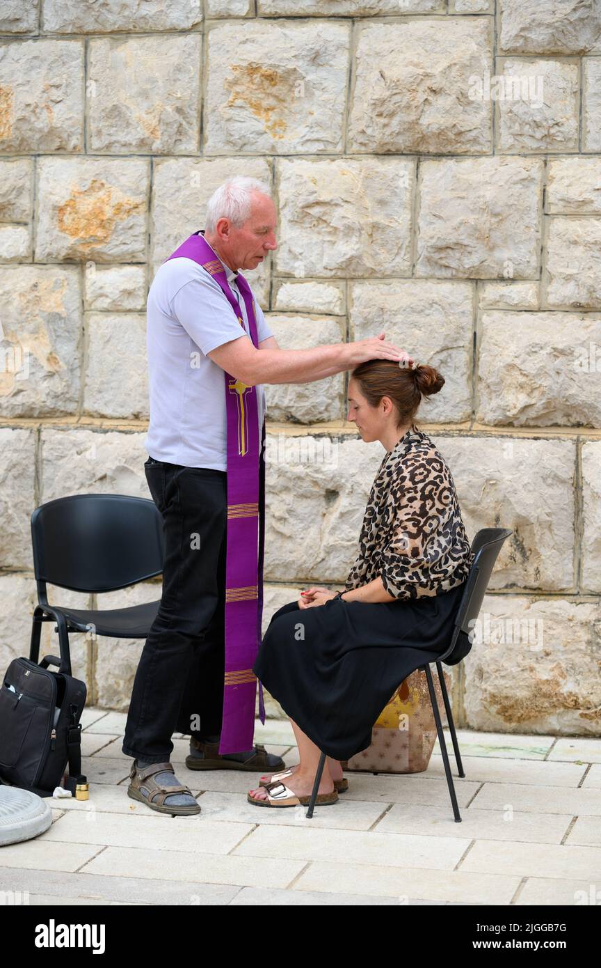 Catholic priest confession hi-res stock photography and images - Alamy