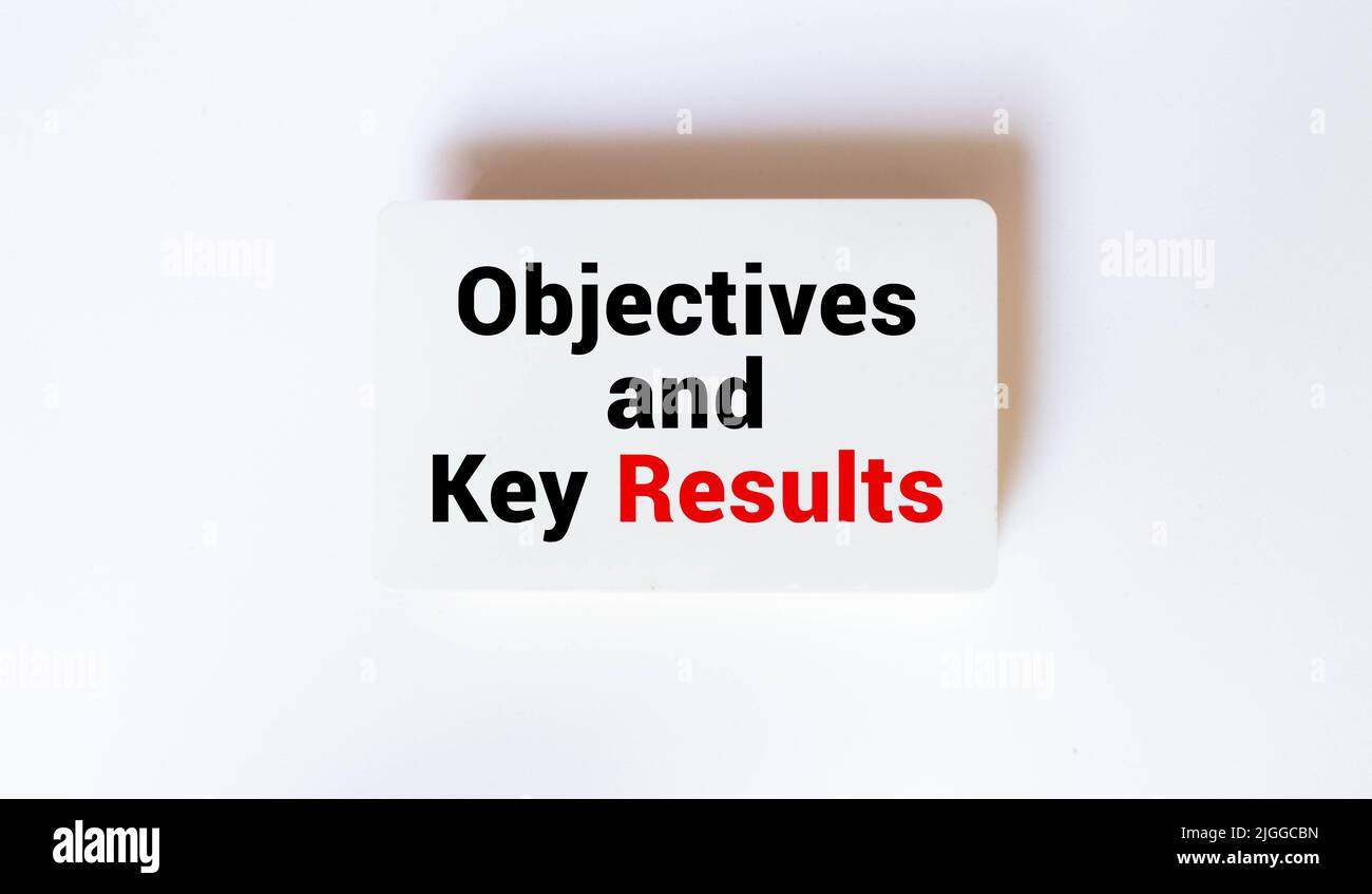 Objective Key Results. Miniature easel on a red background Stock Photo ...