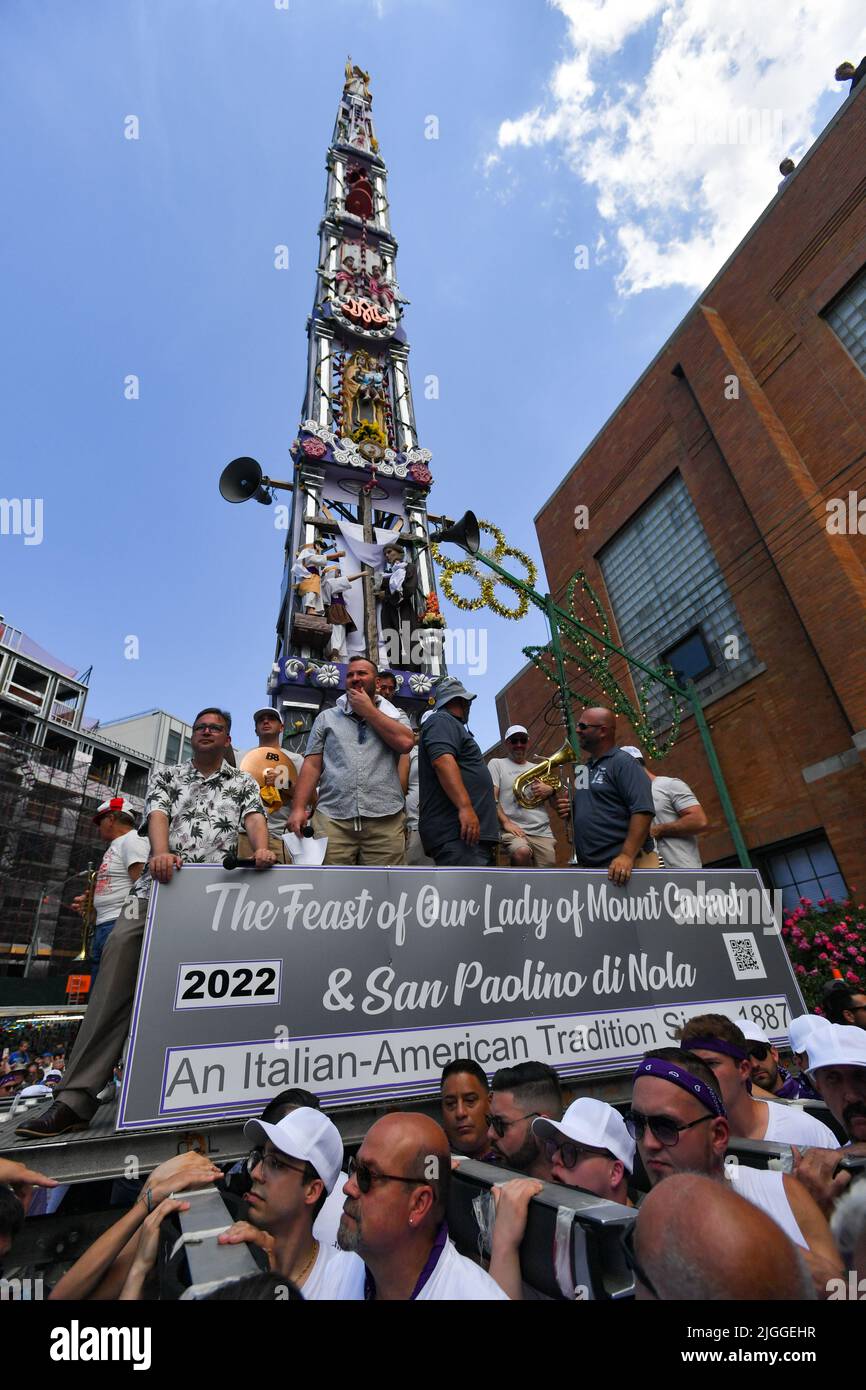 Attendants lift the Giglio during the annual Our Lady of Mount Carmel feast on July 10, 2022 in ...