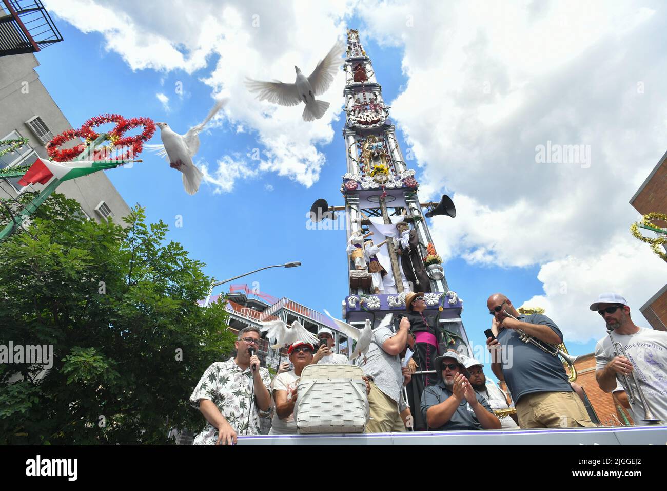 Attendants lift the Giglio during the annual Our Lady of Mount Carmel feast on July 10, 2022 in ...