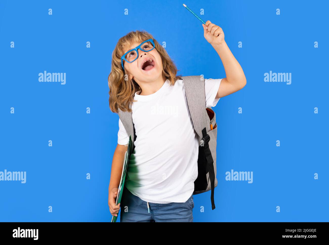 School little student hold books. Kids education concept. Child in ...