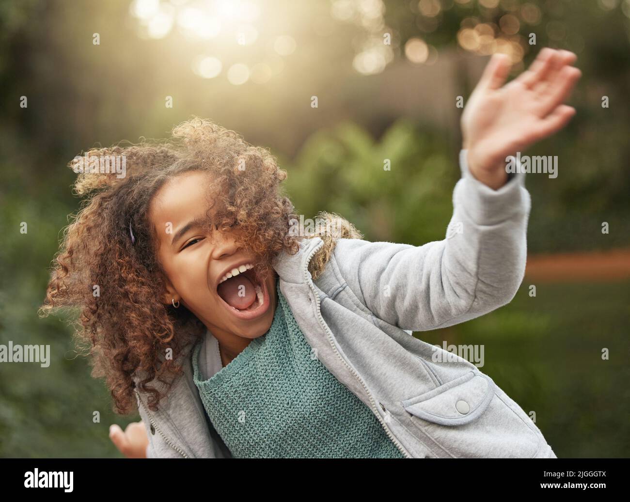 Living life as carefree as I can. an adorable young girl playing ...