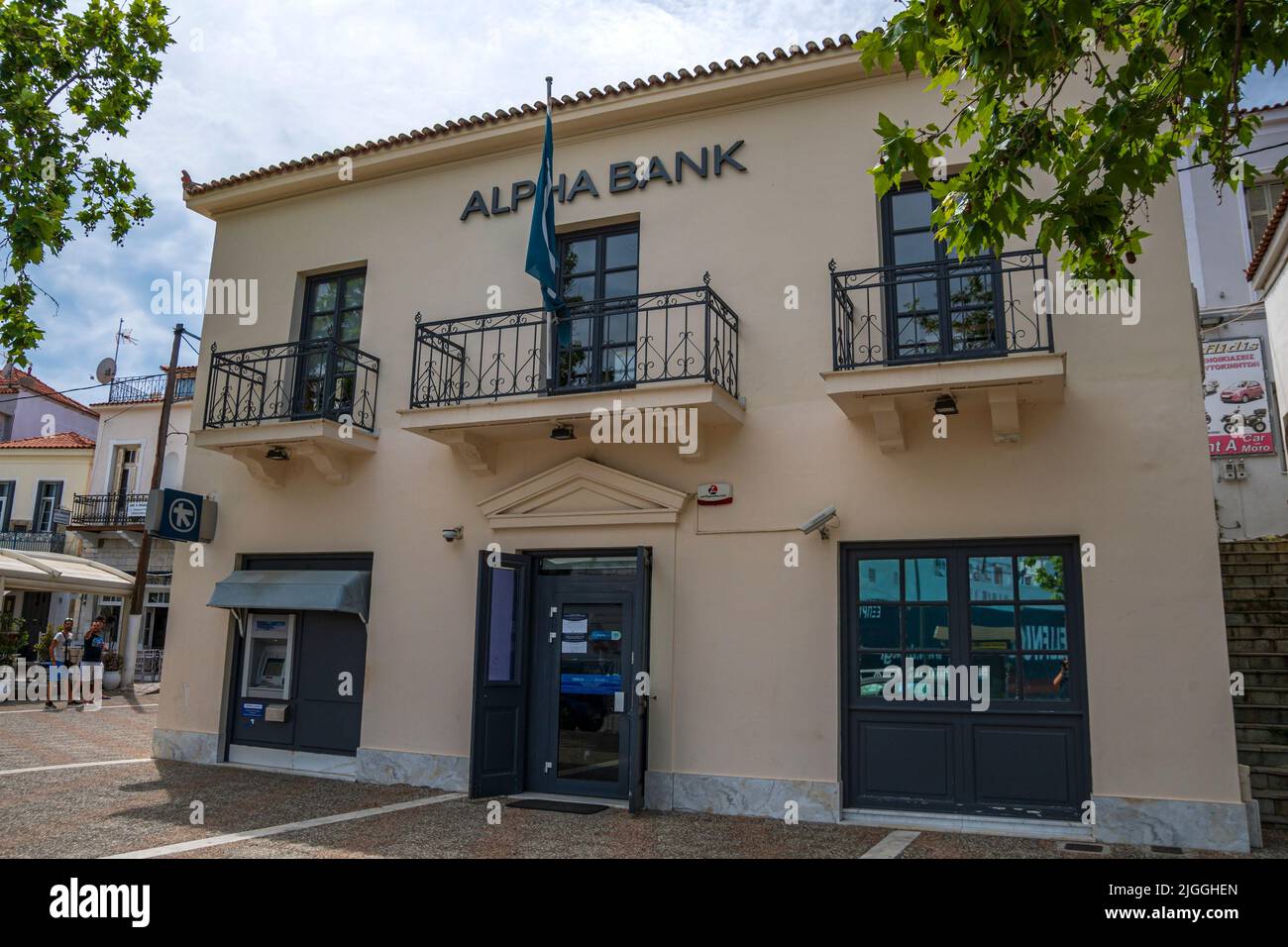 Traditional architectural building of Alpha Bank branch in Skiathos ...
