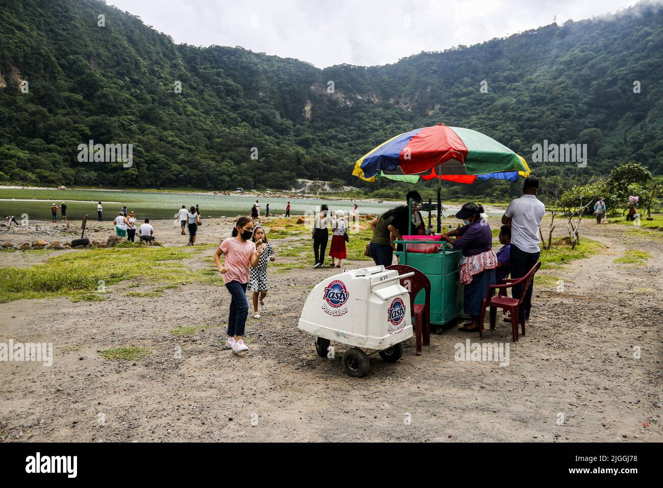 Tourists enjoy the Alegría Lagoon in the Tecapa Volcano. Credit: SOPA ...