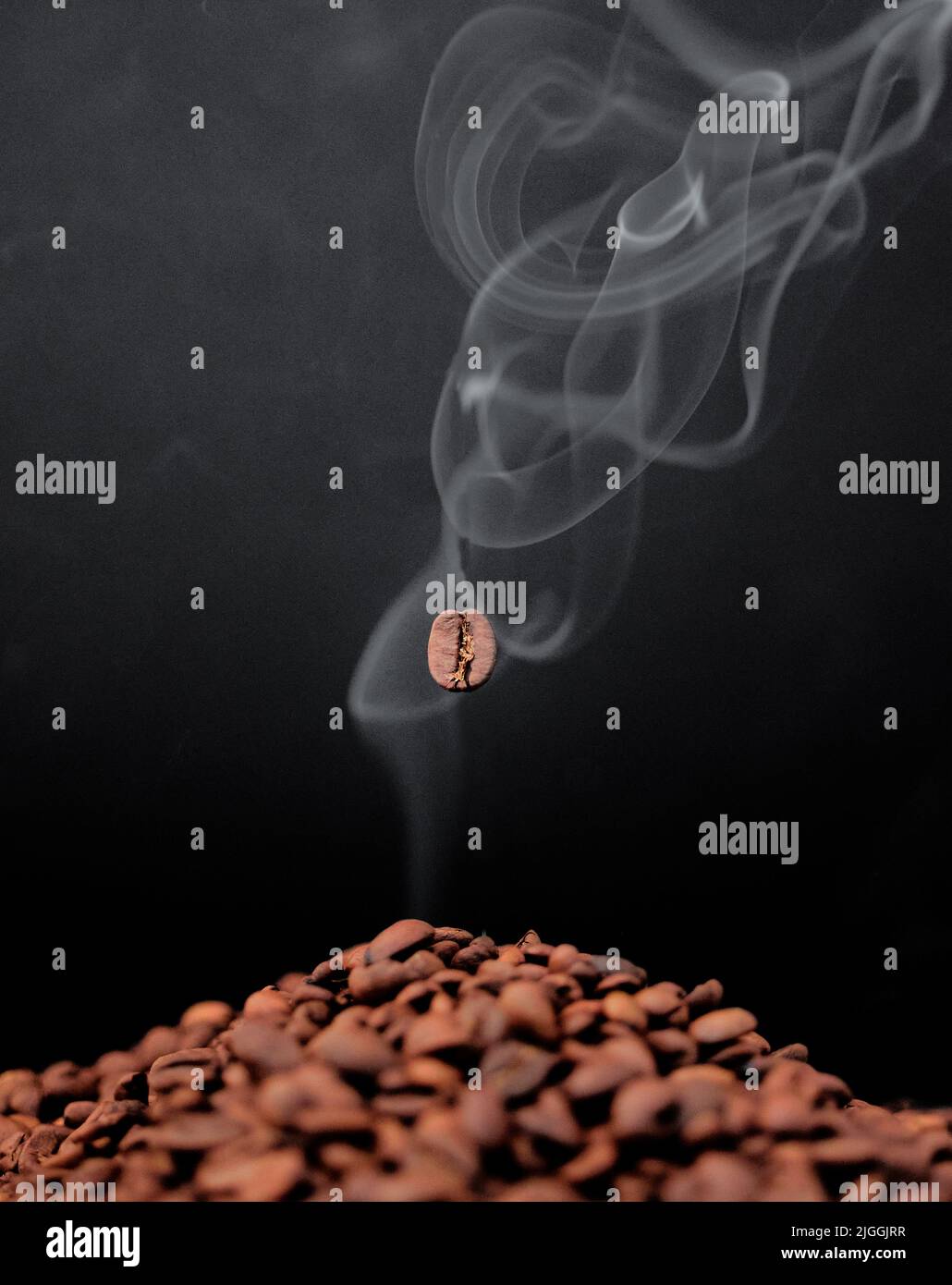 Quality you can taste. Still life shot of coffee beans against a grey ...