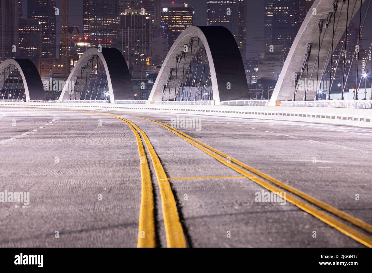 Night descends on the 6th Street Bridge as it passes through Downtown ...