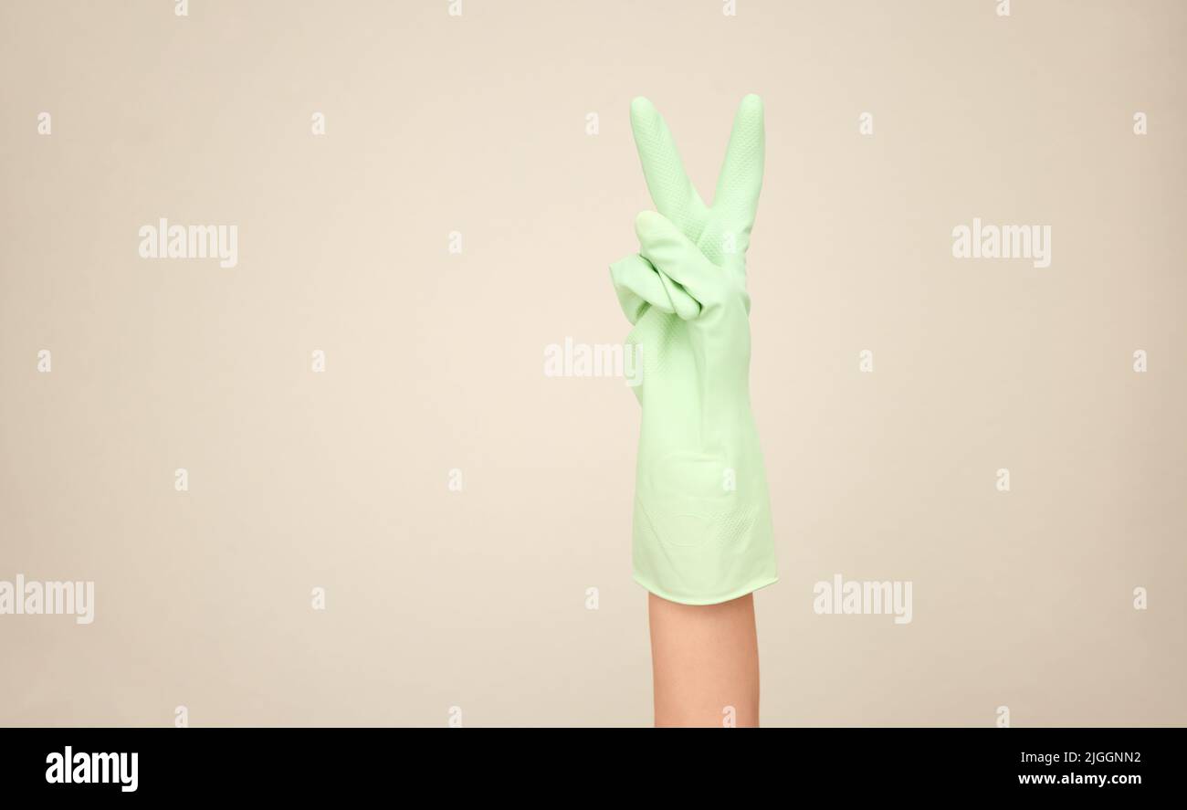 A clean home is a peaceful home. an unrecognizable person showing a ...