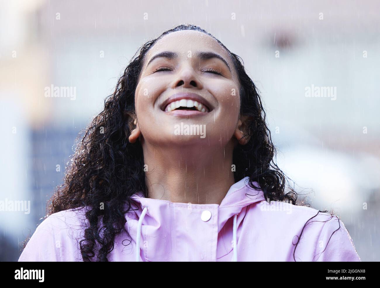 Female enjoying rain hi-res stock photography and images - Alamy