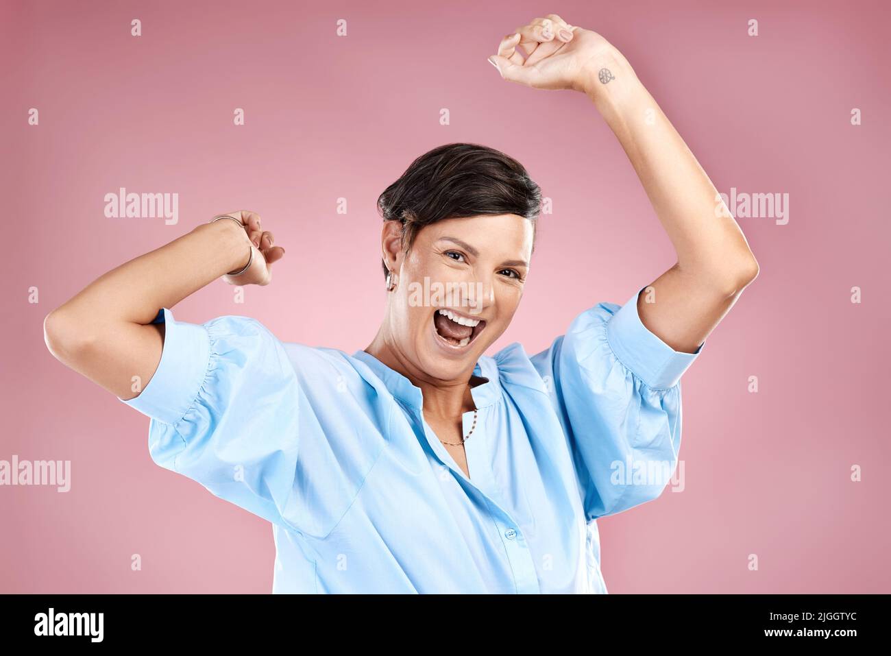 Cheer your own successes. Cropped portrait of an attractive young woman ...