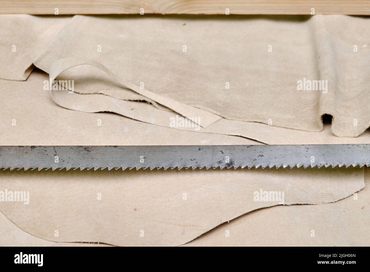 Making medieval shields made of wood and leather to protect soldiers in ...