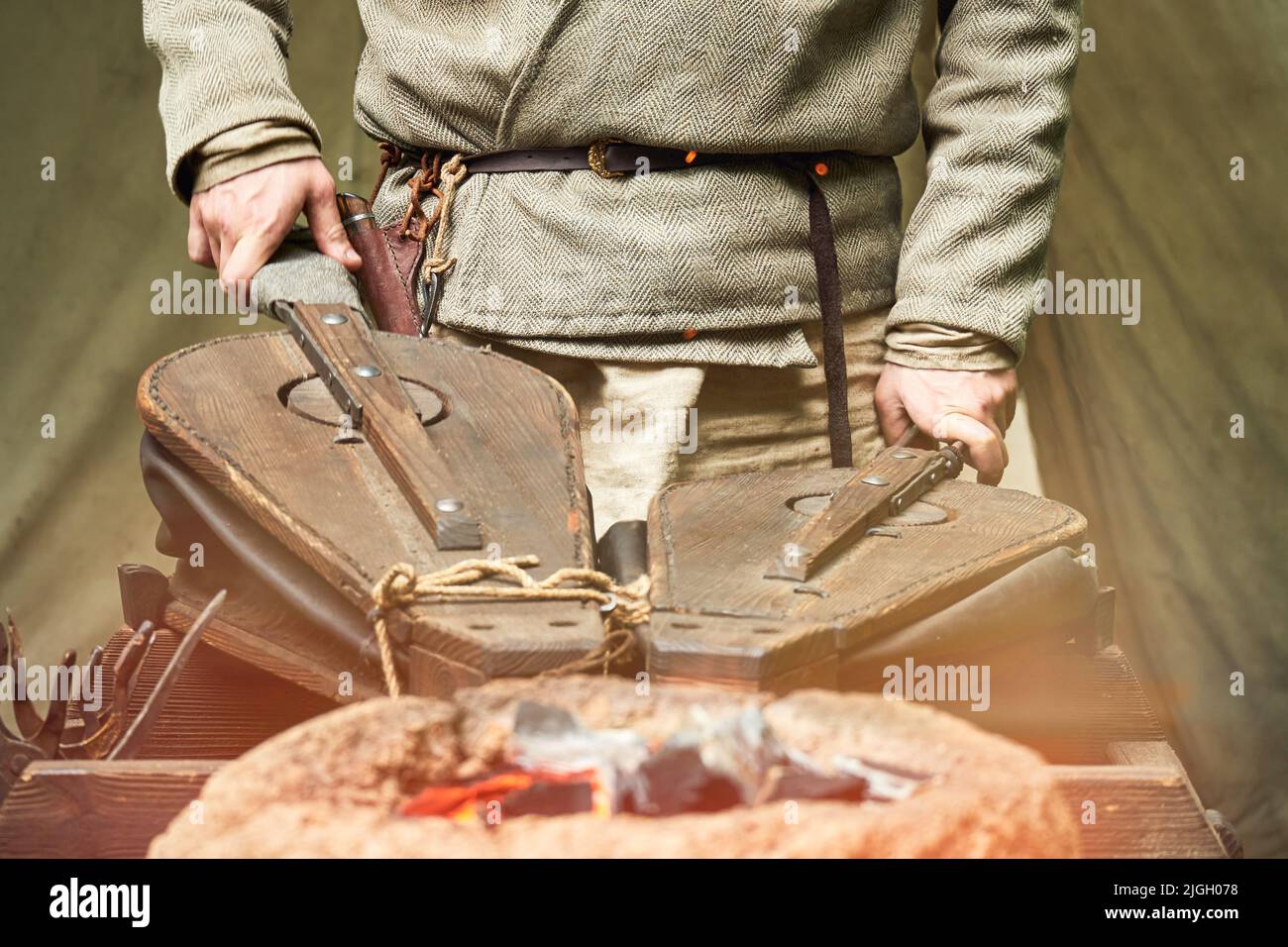 Work of a medieval blacksmith for the manufacture of metal products ...