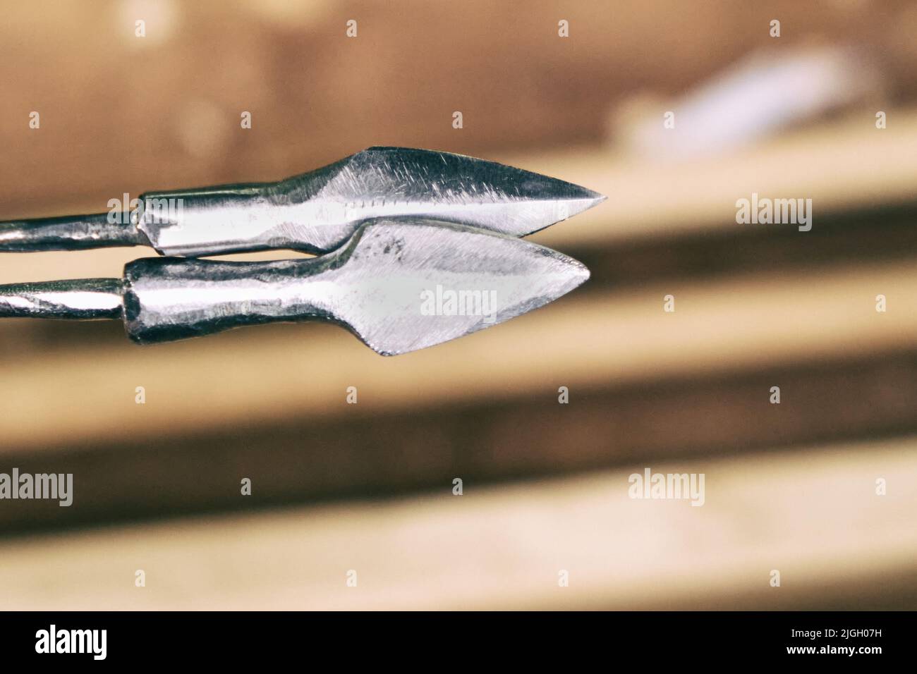 Making medieval arrows for bow shooting. Reconstruction of the events of the Middle Ages in ...