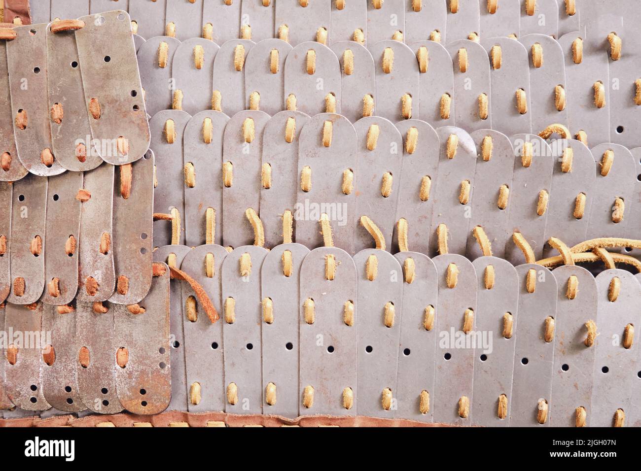 Medieval vintage metal scale armor, background. Reconstruction of the ...