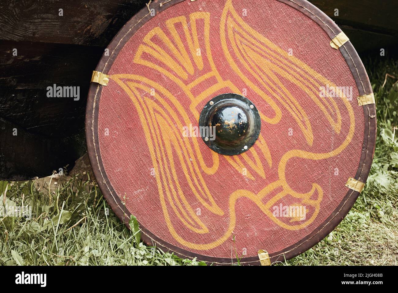 Red vintage shield with with the phoenix bird a medieval warrior ...
