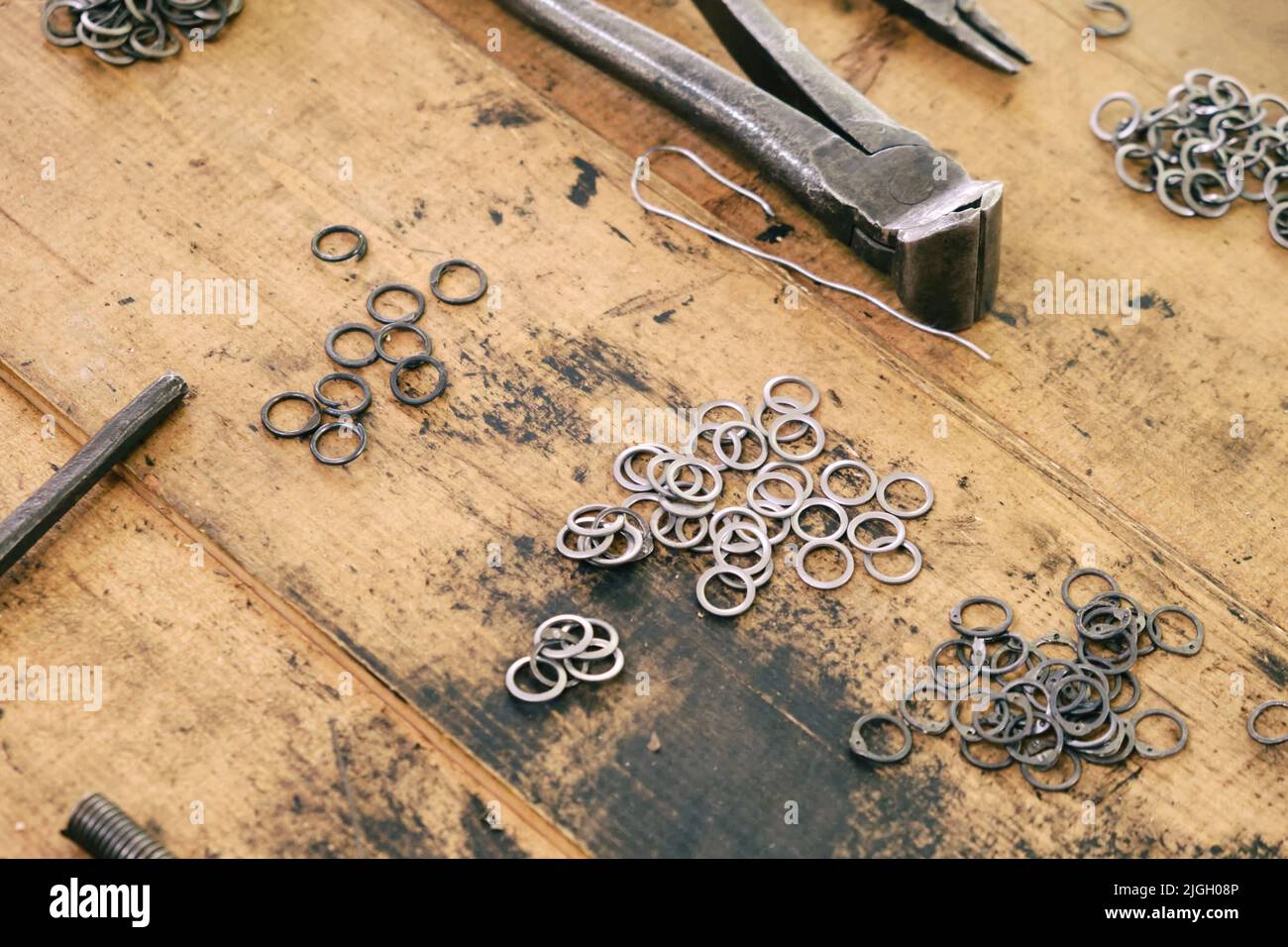 Manufacture of medieval armor and chain mail to protect soldiers in ...