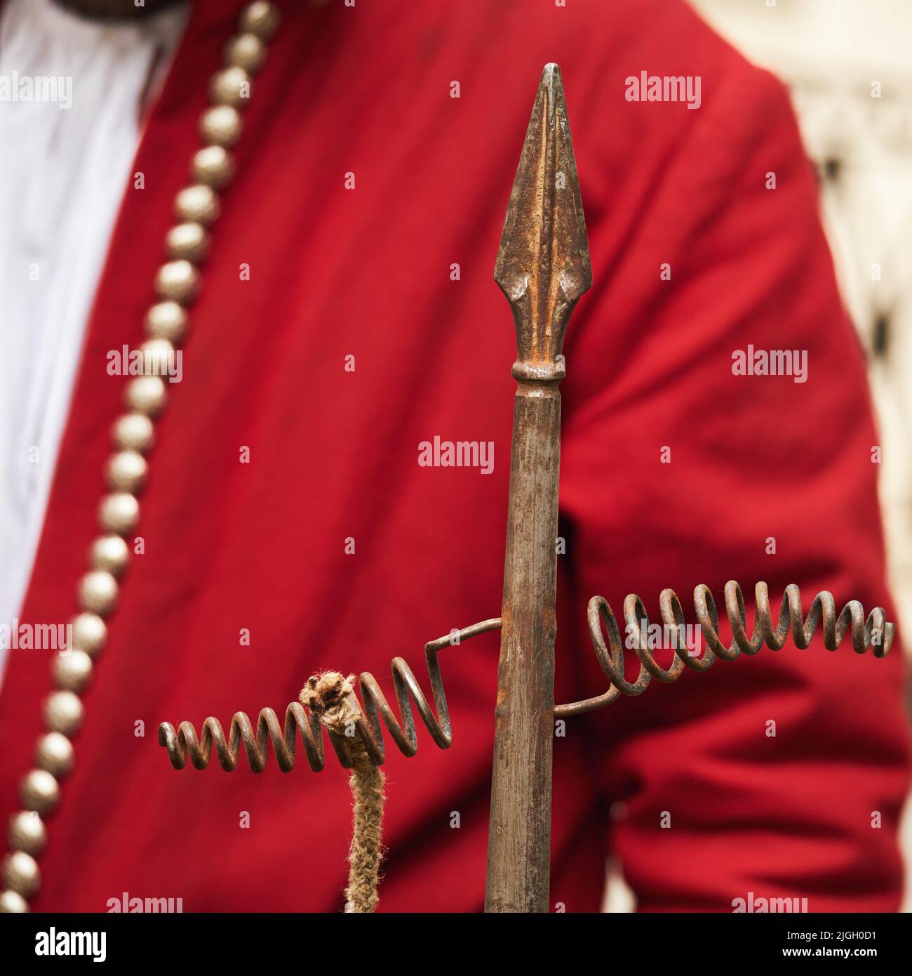 A male gunner in a vintage Swedish military uniform with a ramrod in ...