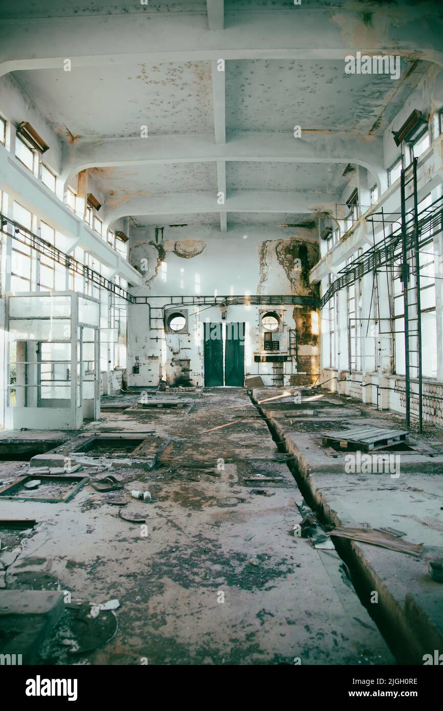 Abandoned ruined industrial building room inside interior, dark dirty ...