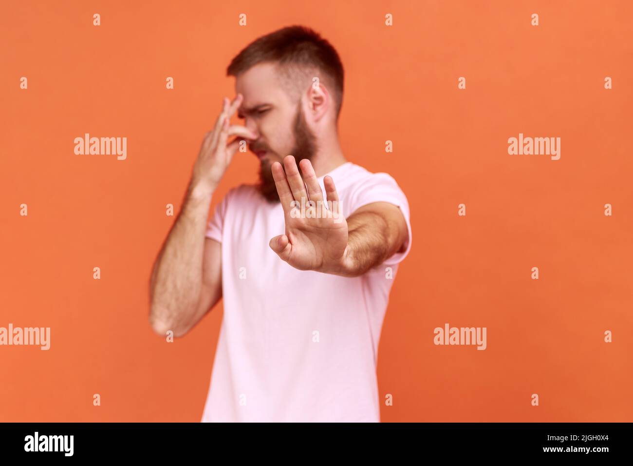 Grabbing nose hi-res stock photography and images - Alamy