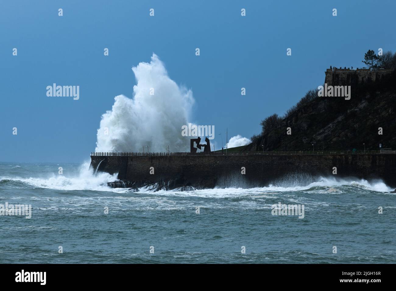 Waves breaking on the New Promenade of San Sebastian during a storm ...