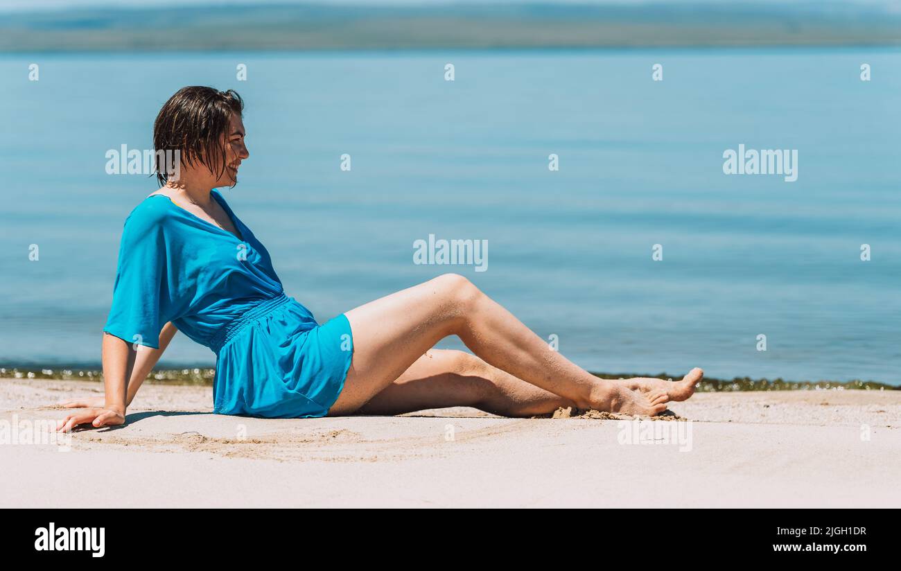 Young woman in pareo hi-res stock photography and images - Alamy