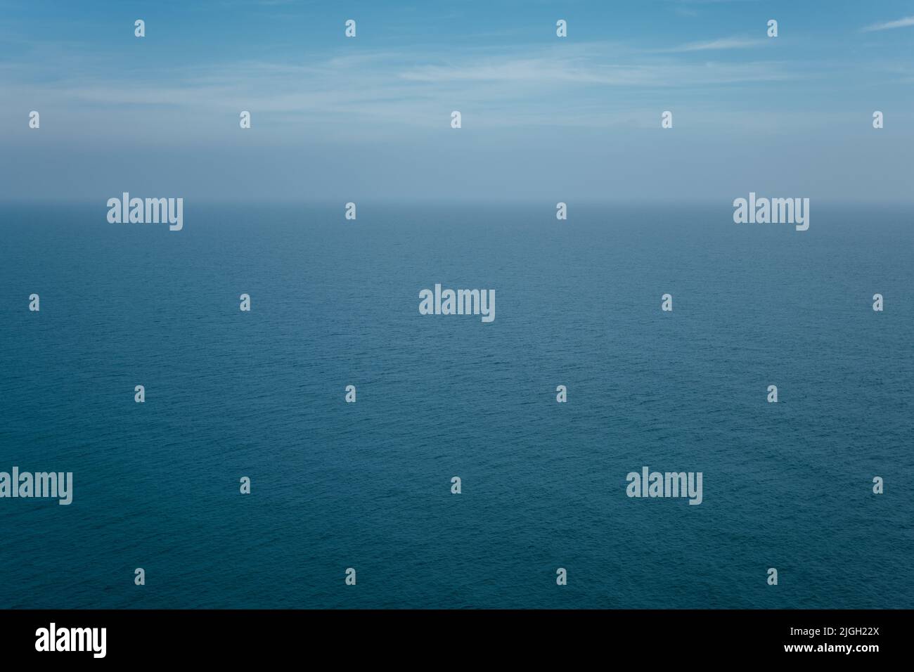 The front view of the sea with morning sky and fuzzy horizon. The ocean ...