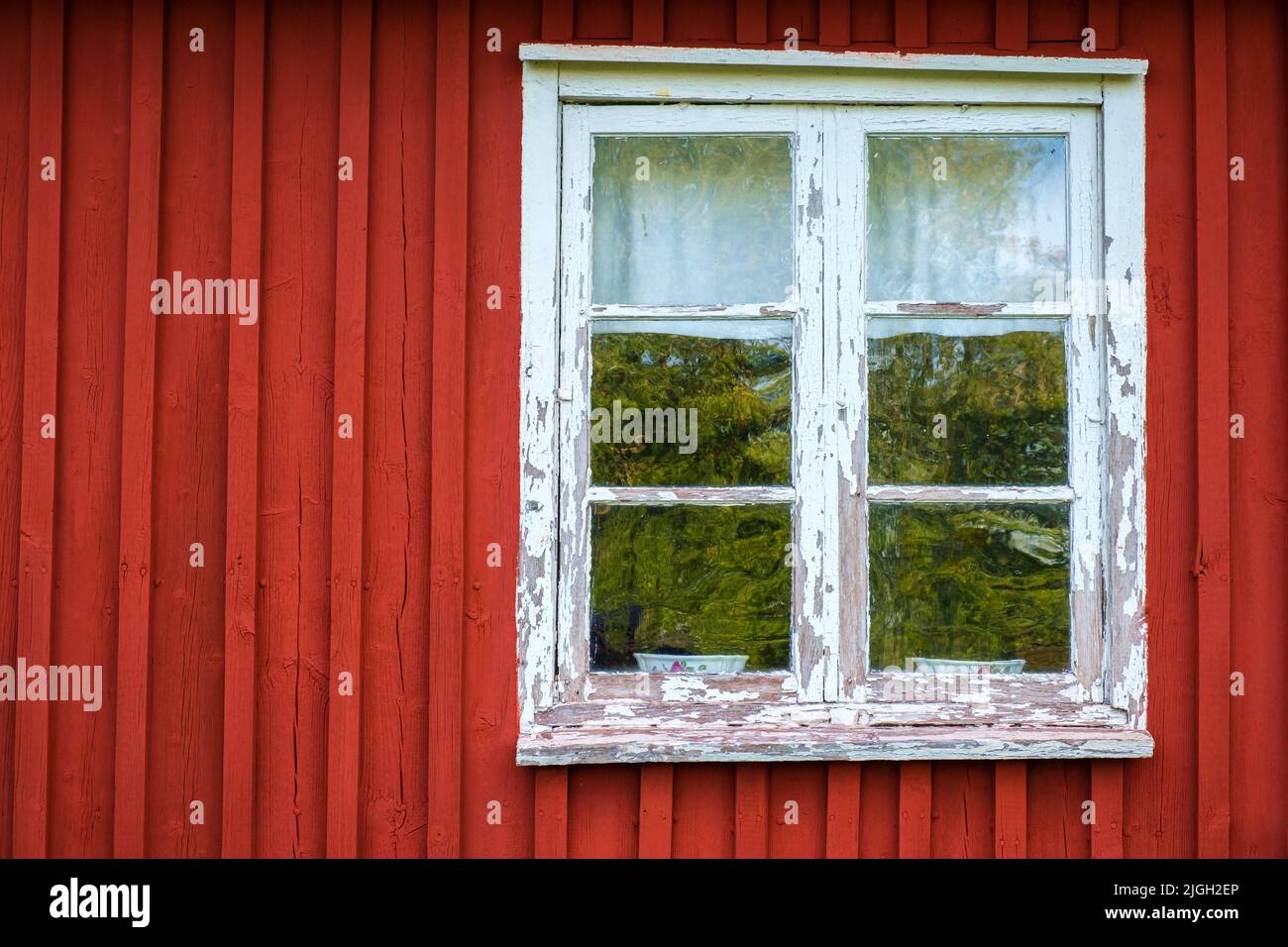 Old wooden cottage with a window Stock Photo - Alamy