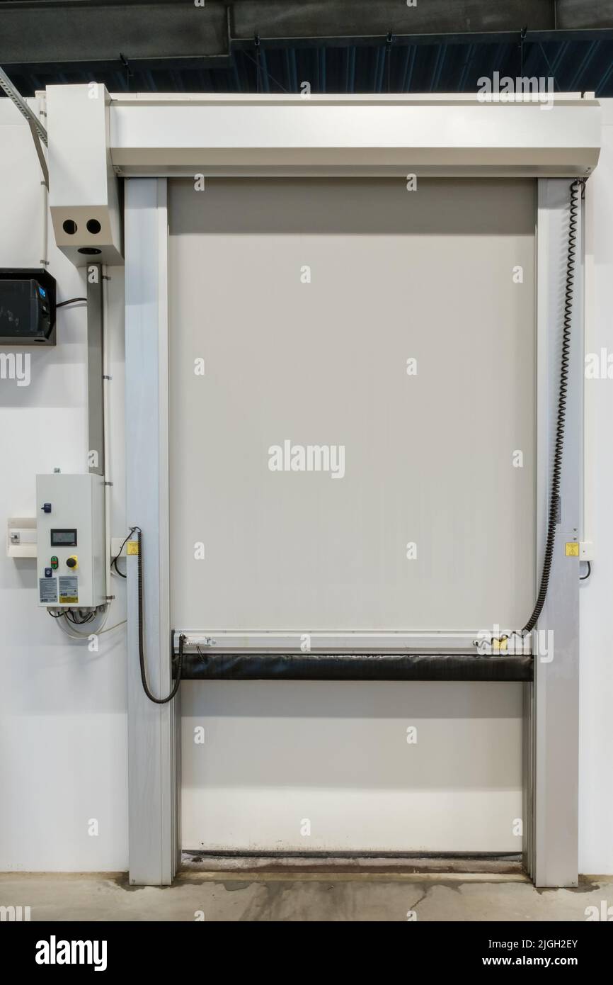 Industrial warehouse roller doors hi-res stock photography and images ...