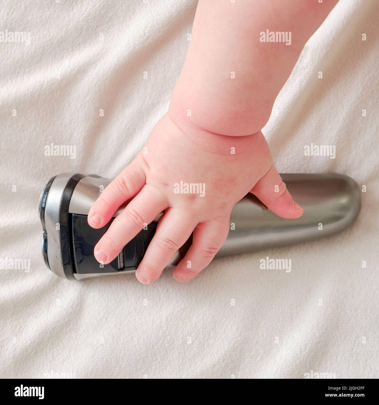 Black man holding baby skin to skin hi-res stock photography and images ...