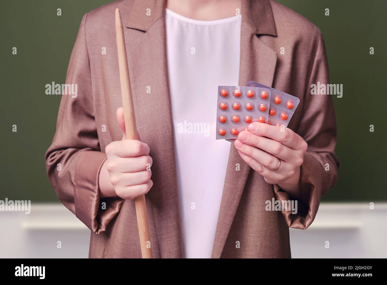 Sick teacher in the classroom hi-res stock photography and images - Alamy
