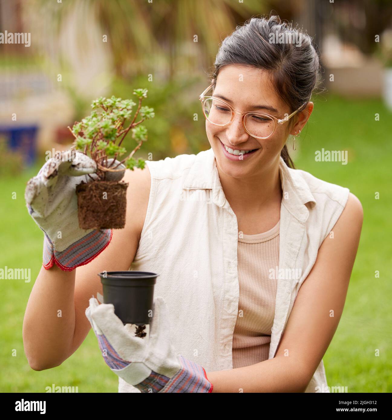 Have you stopped to see what grows with time. a young woman happily ...