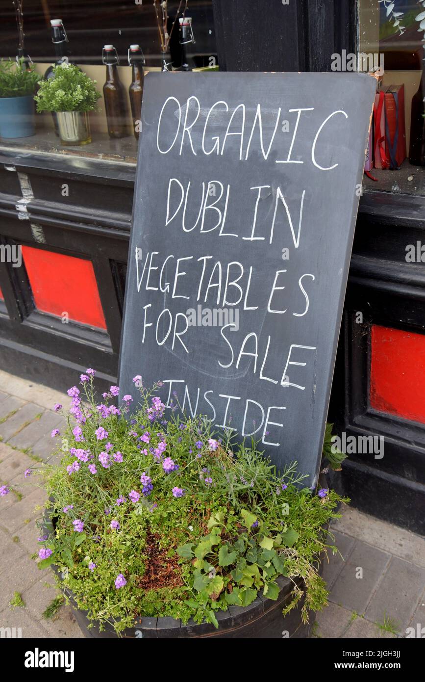 A blackboard advertising organic local Dublin vegatables for sale ...