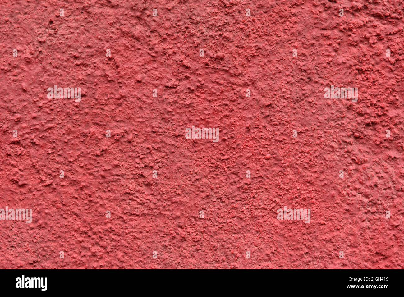 a concrete wall painted with red spray paint Stock Photo - Alamy