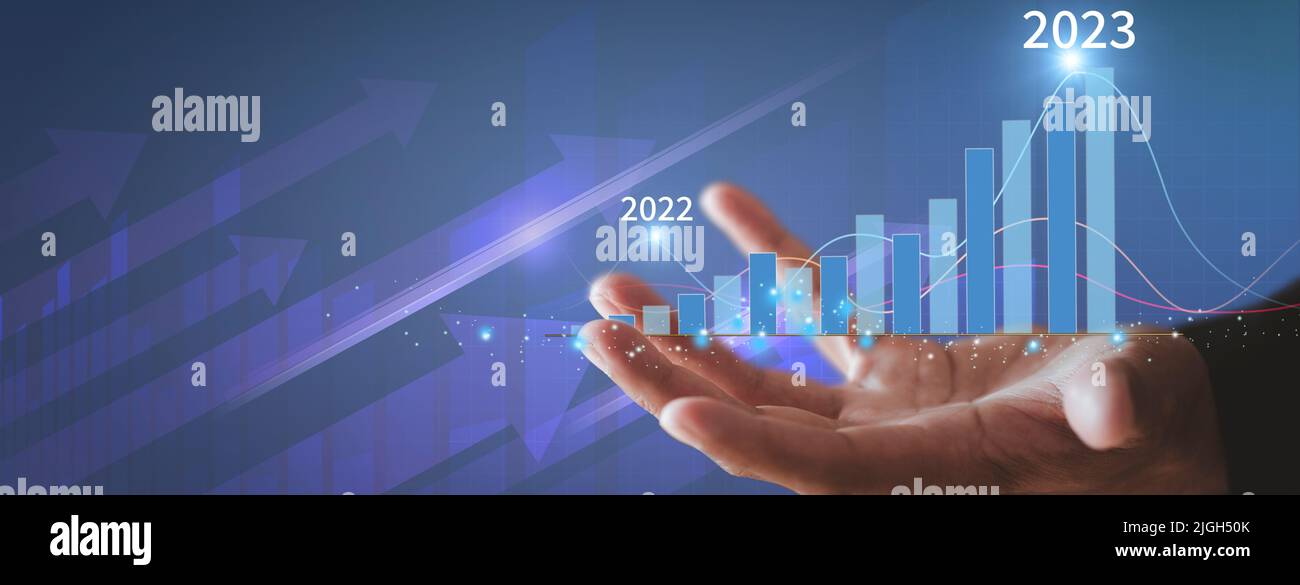 Businessman show golden stock market bar chart grow up to target ...