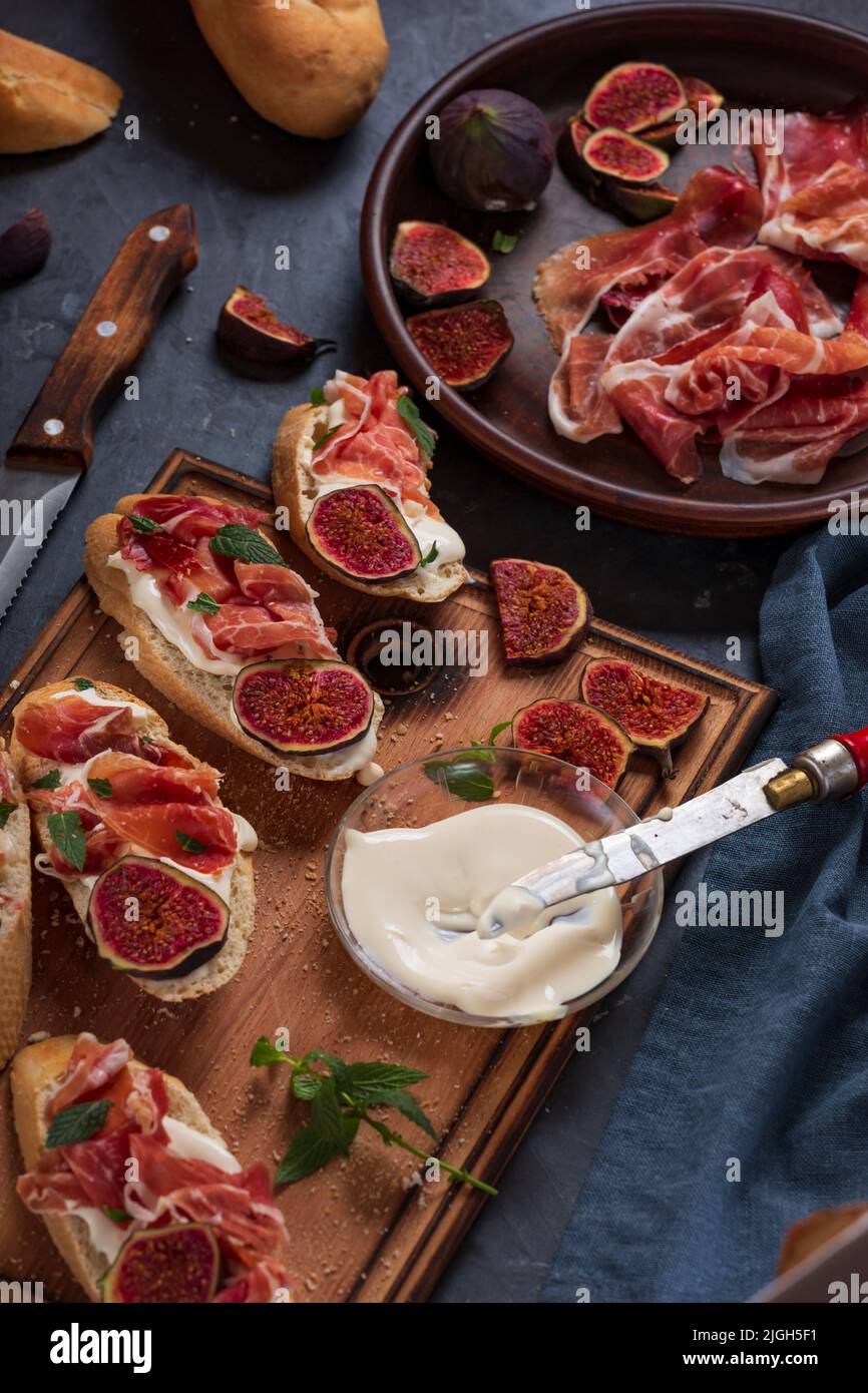 Sandwiches with cream cheese and jamon, close-up spanish appetizers ...