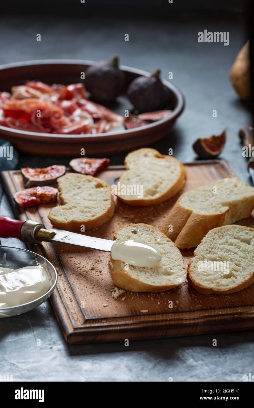 Making ham sandwiches and tapas ingredients, CLOSE UP Stock Photo - Alamy