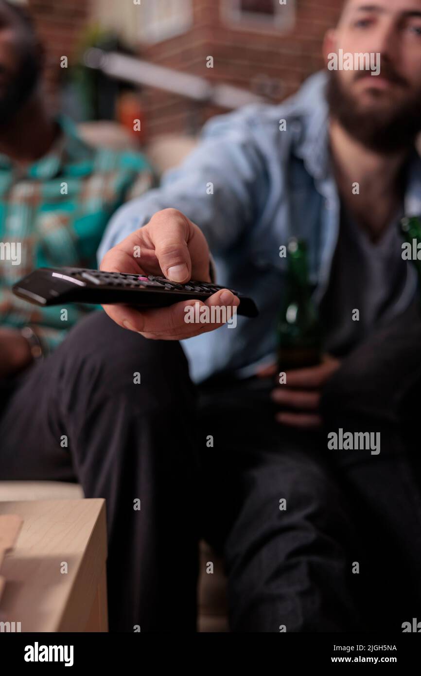 Person with tv remote control hi-res stock photography and images - Alamy