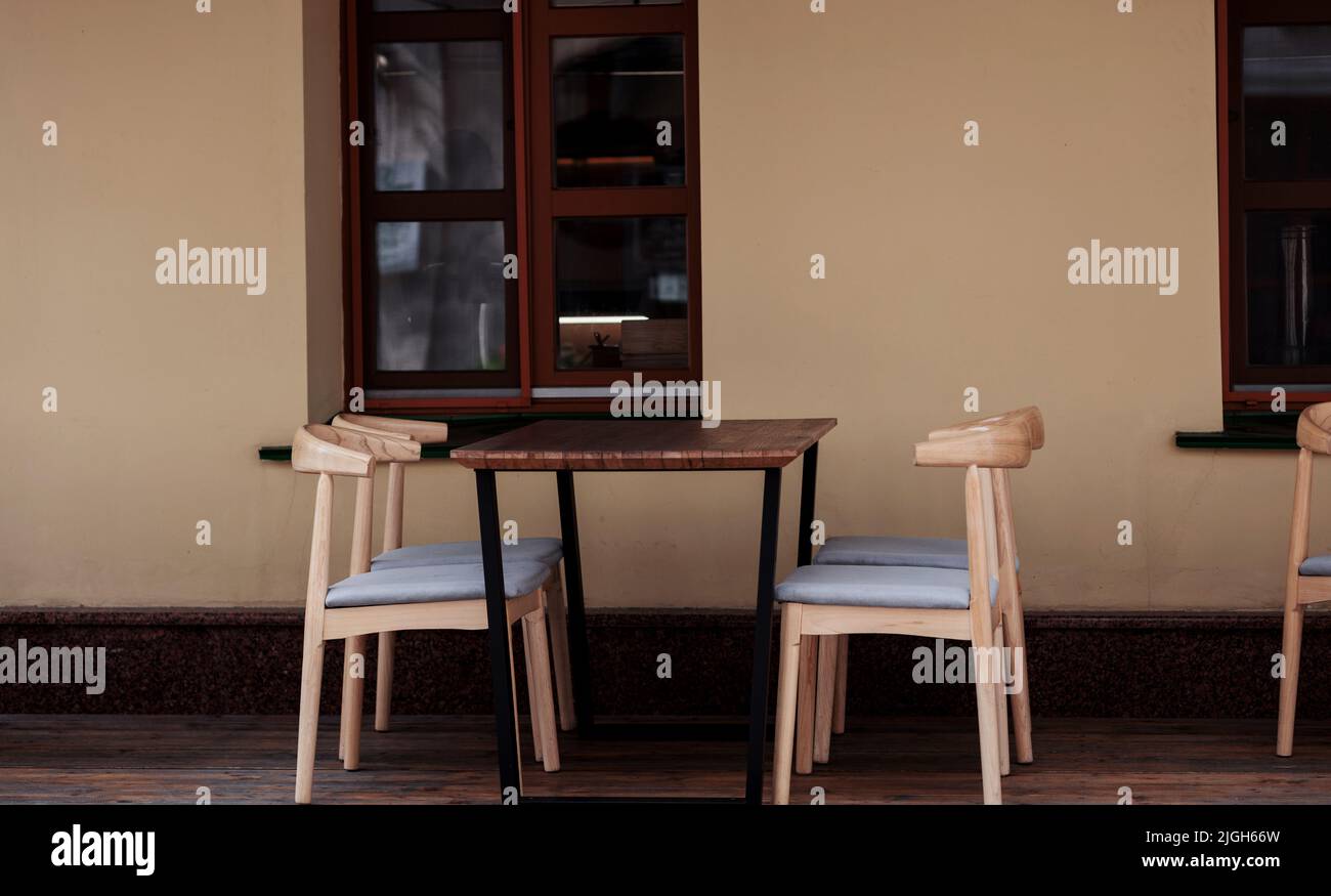 Outdoor empty cafe and restaurant terrace. Old street cafe Stock Photo ...