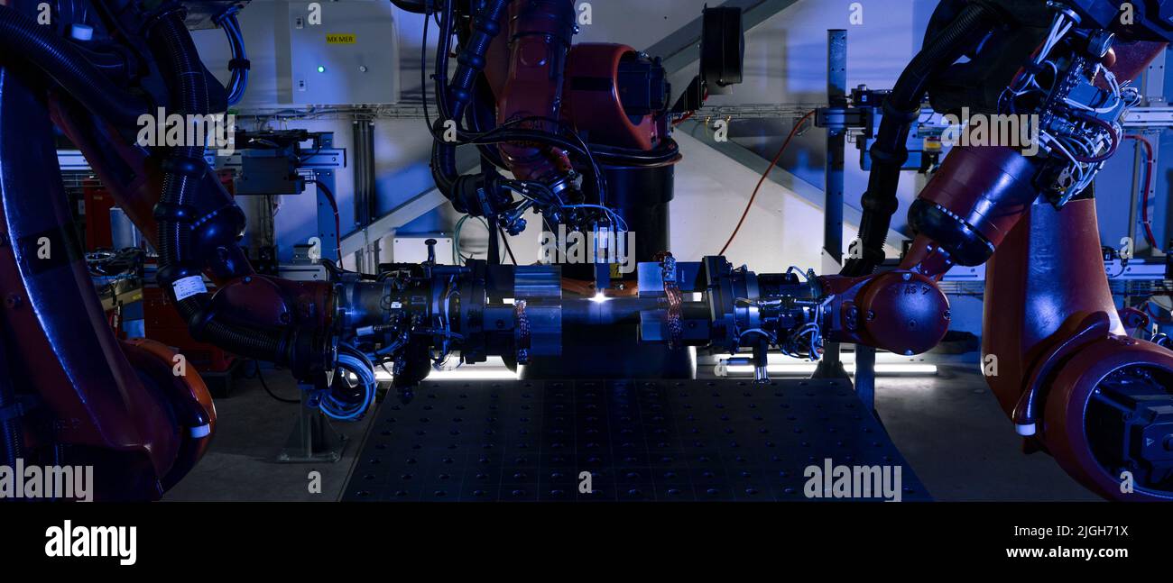 Robotic arm at industrial manufacture factory. Automated production ...