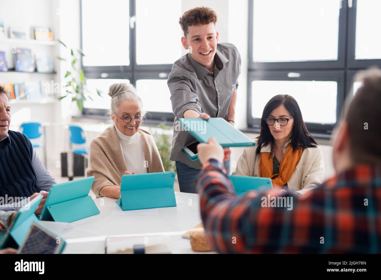 Student attending class with tablet hi-res stock photography and images ...
