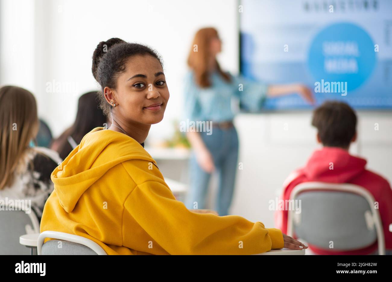 Secondary student in desk hi-res stock photography and images - Alamy