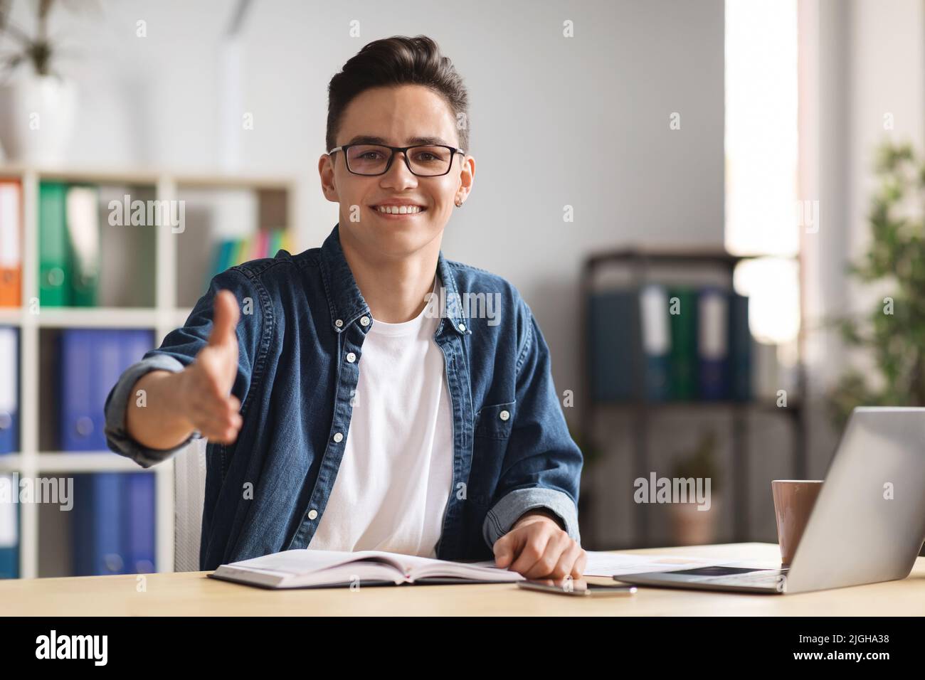 Partnership Concept. Friendly Millennial Businessman Extending Hand For ...