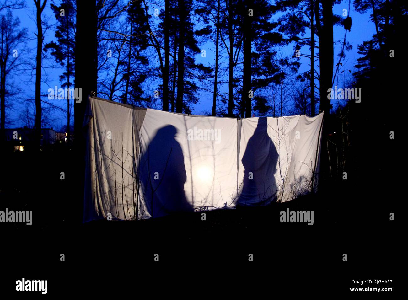 Ghost walk in a forest Stock Photo - Alamy