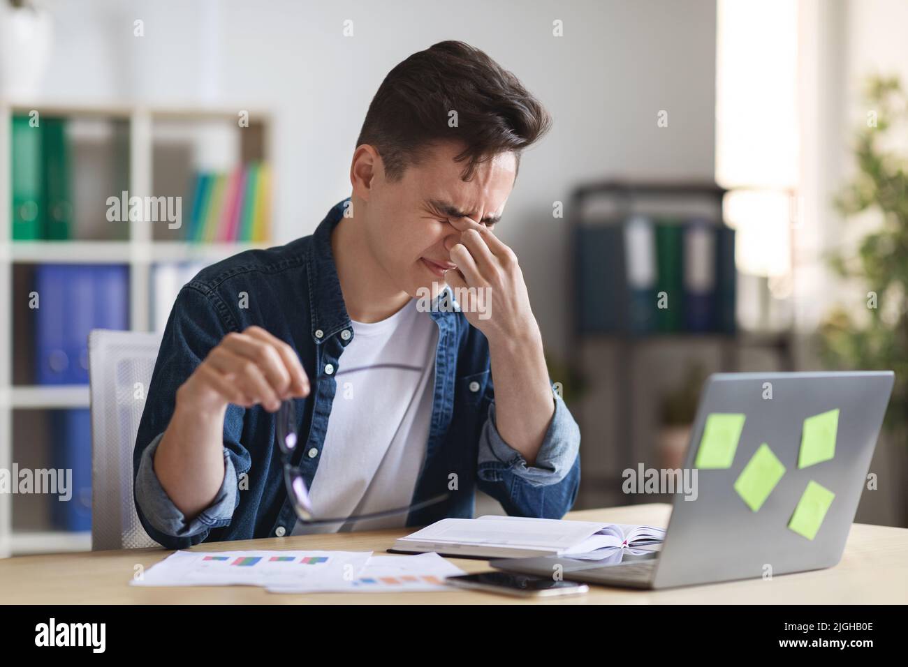 Overworking. Portrait Of Tired Young Office Employee Suffering Eyes ...
