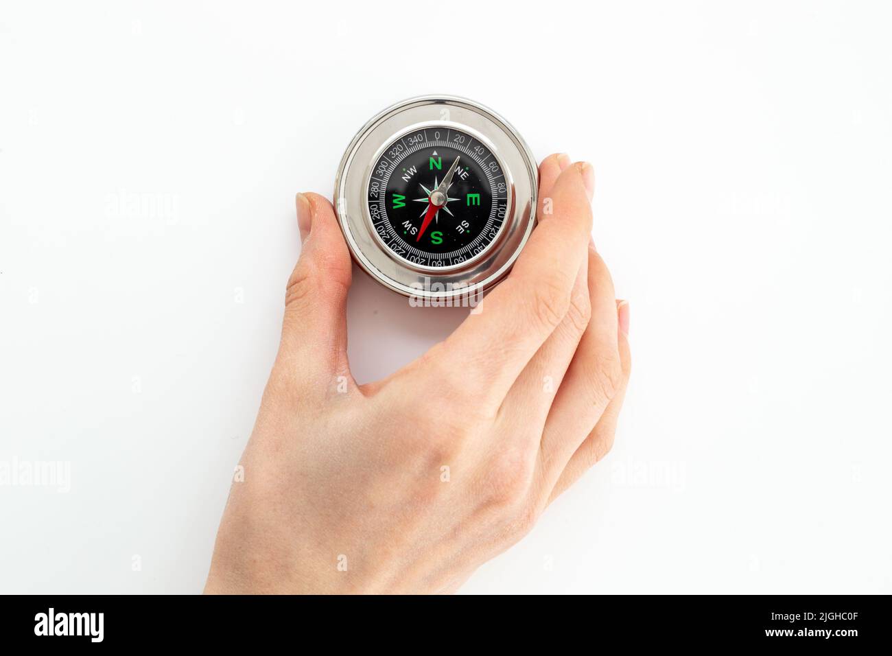 Compass in businessmans hand. Business navigates recovery concept Stock ...