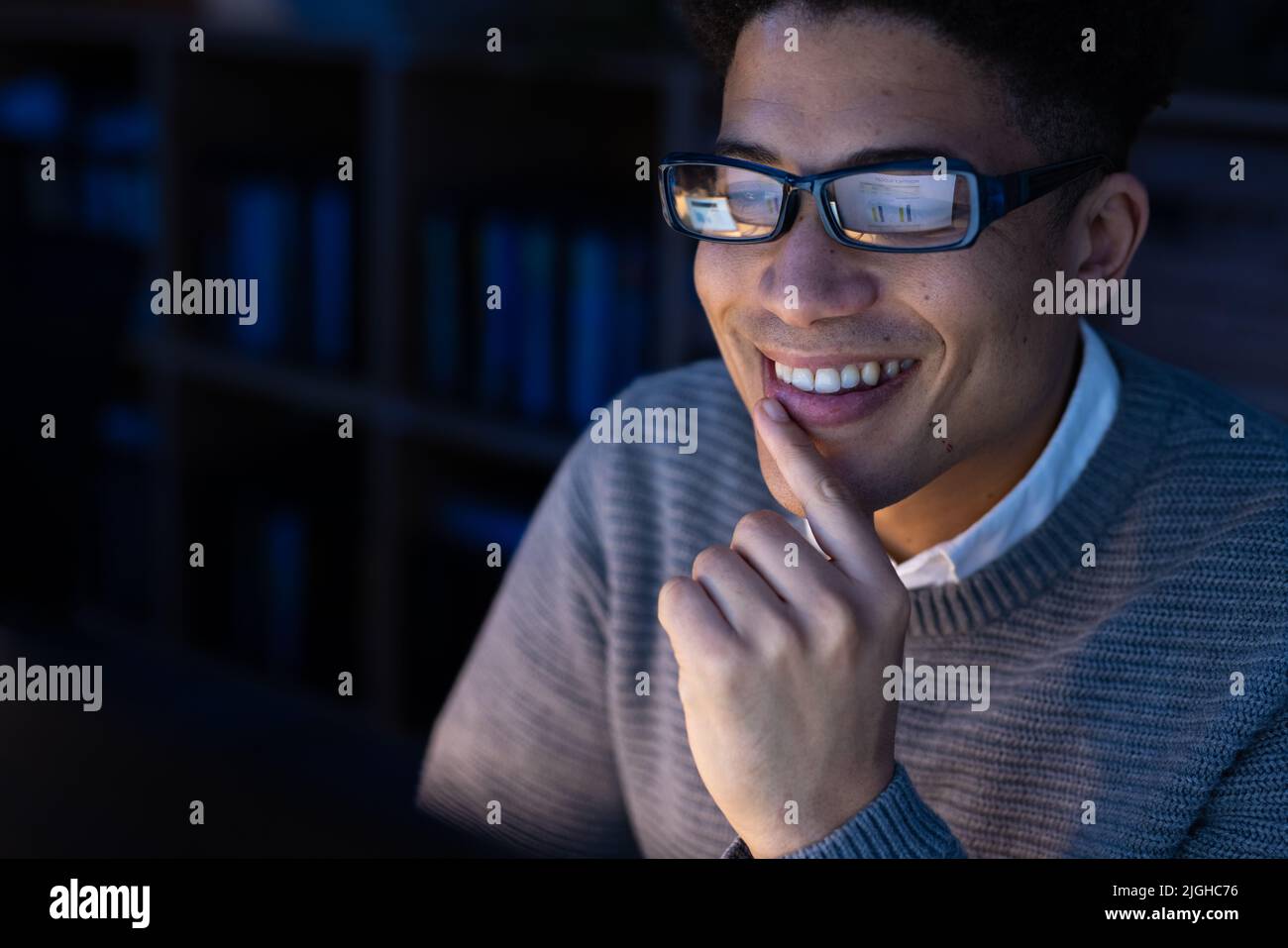 Close-up of smiling asian male professional wearing eyeglasses with ...