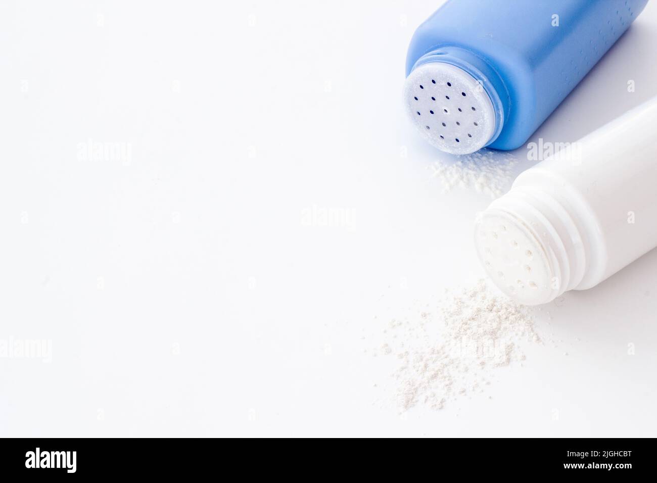 Talcum powder in container. Spilled white powder Stock Photo - Alamy